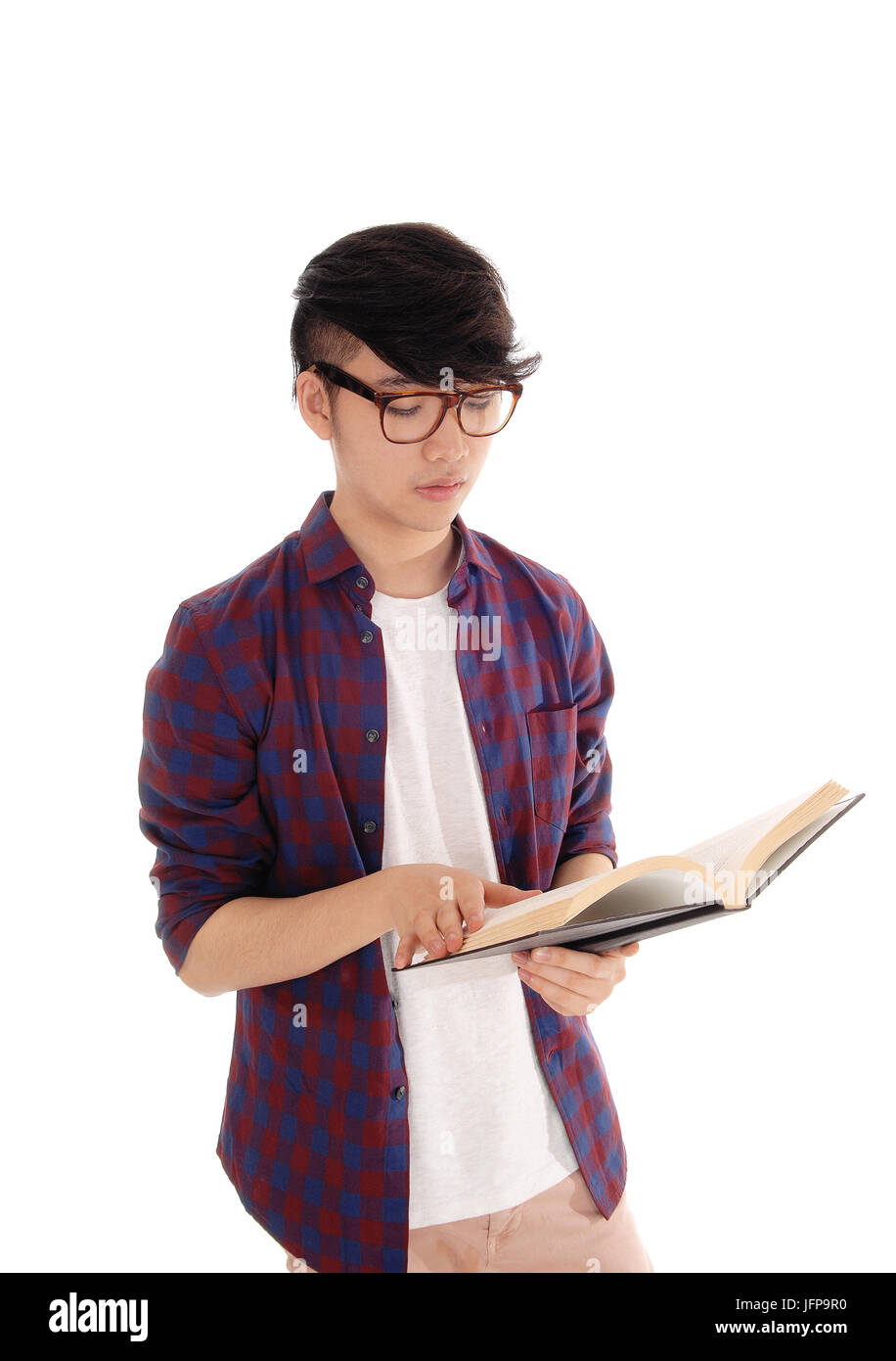 Young Asian man reading book Stock Photo - Alamy