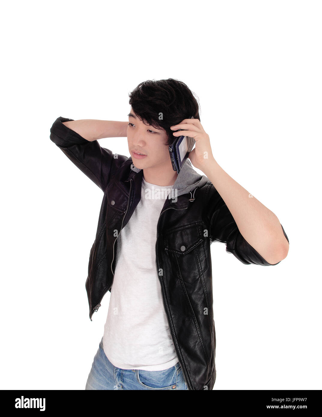 Asian man talking on his cellphone Stock Photo - Alamy