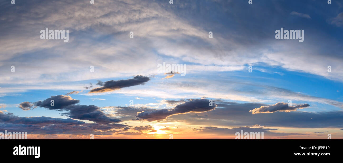 Sunset sky panorama with clouds Stock Photo - Alamy