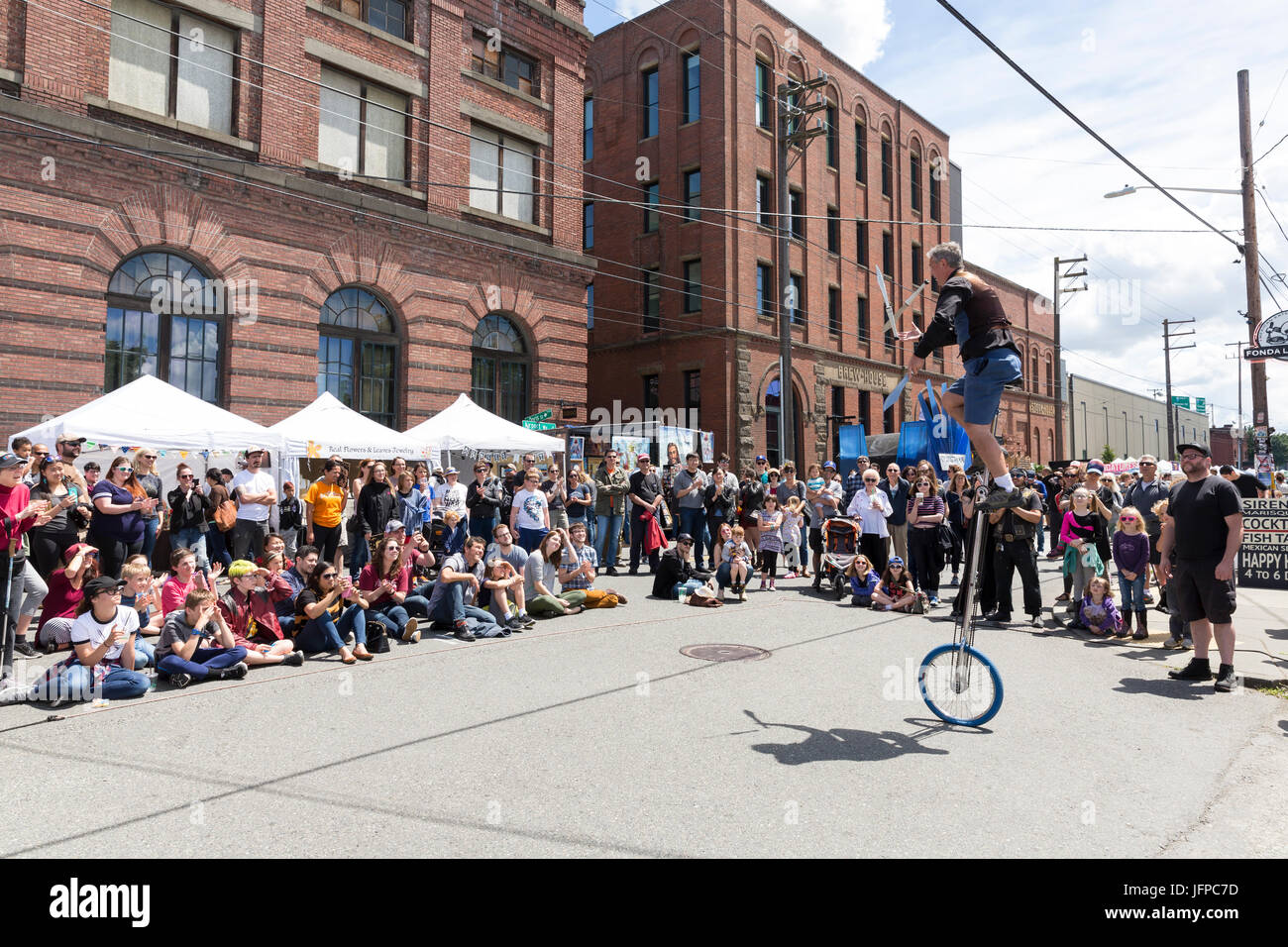 Juggling on a unicycle hi-res stock photography and images - Alamy
