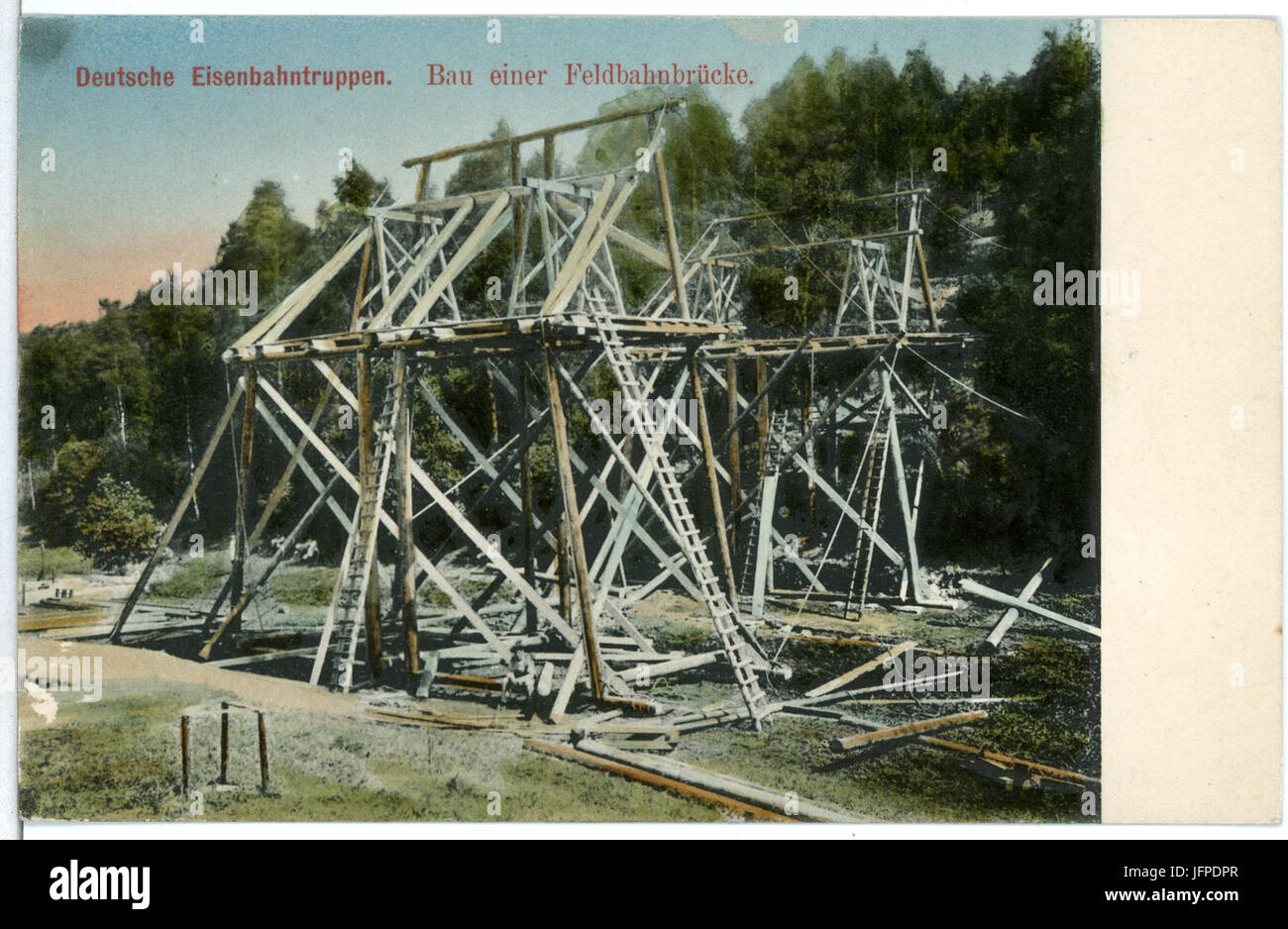 This 1910 postcard shows the construction of a military railway bridge ...