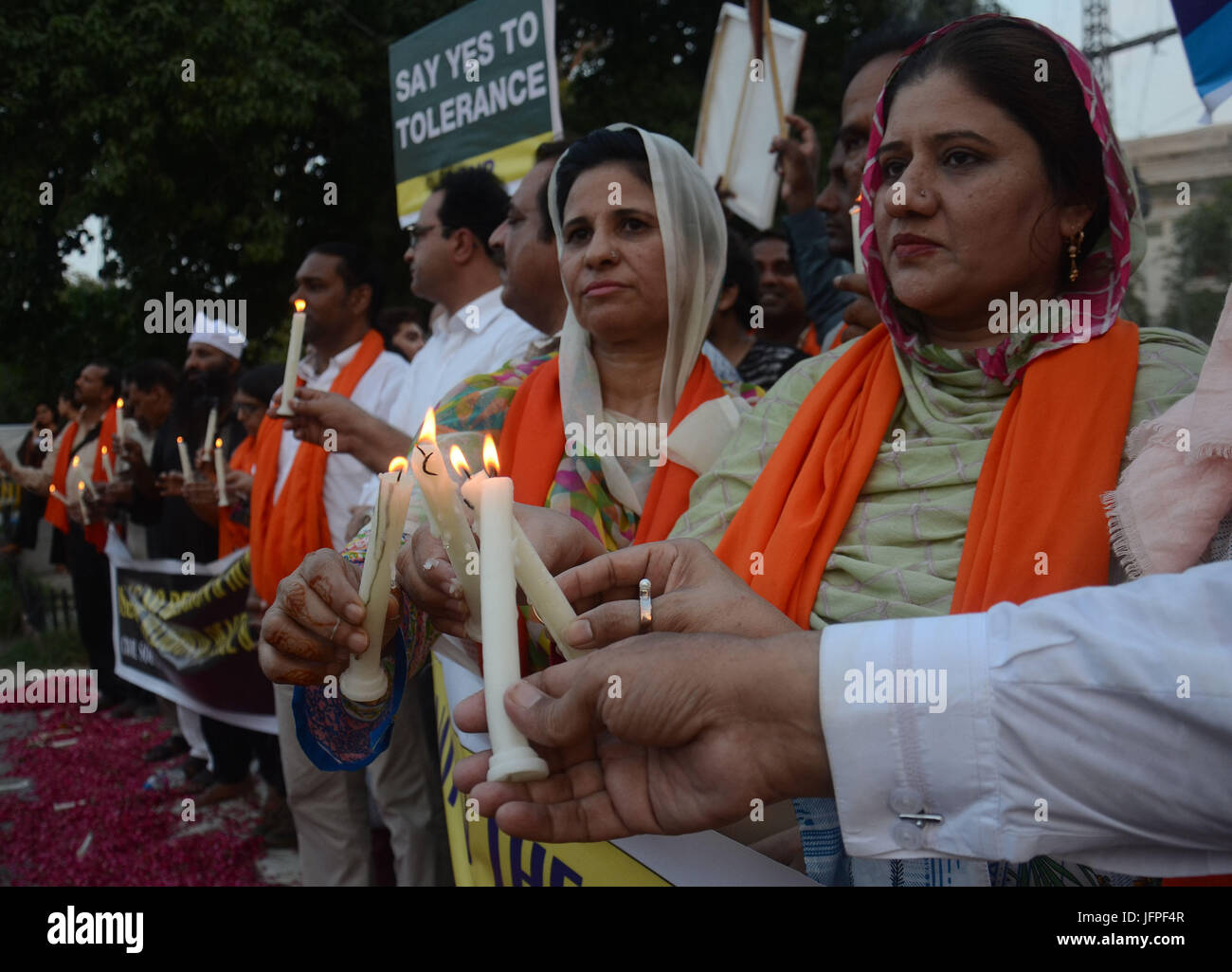 Pakistani civil society Network and Rawadari Tehreek activists hold a ...