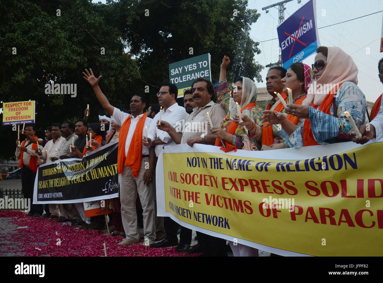 Pakistani civil society Network and Rawadari Tehreek activists hold a ...