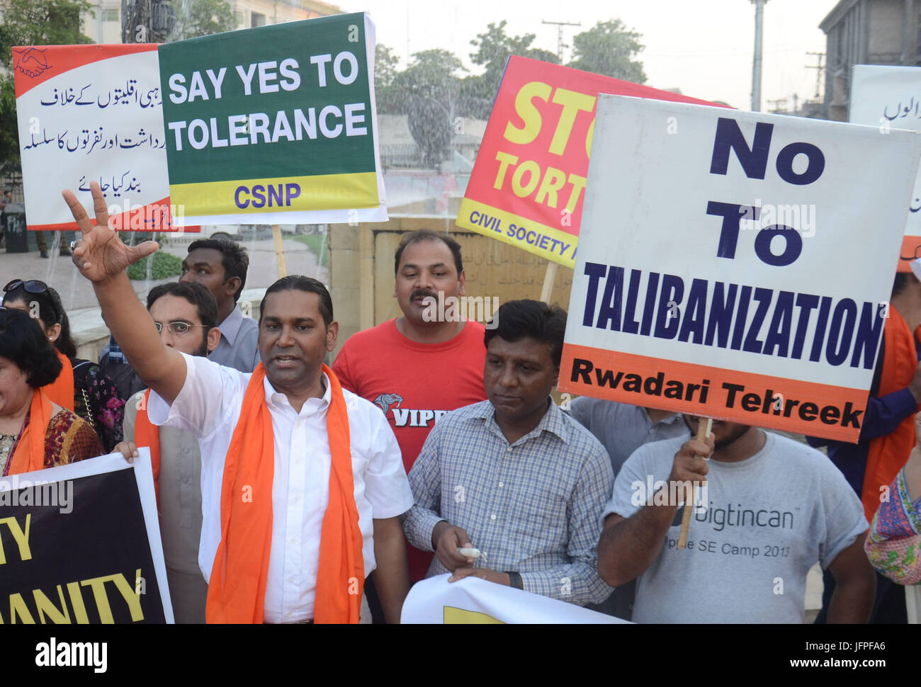 Pakistani civil society Network and Rawadari Tehreek activists hold a ...
