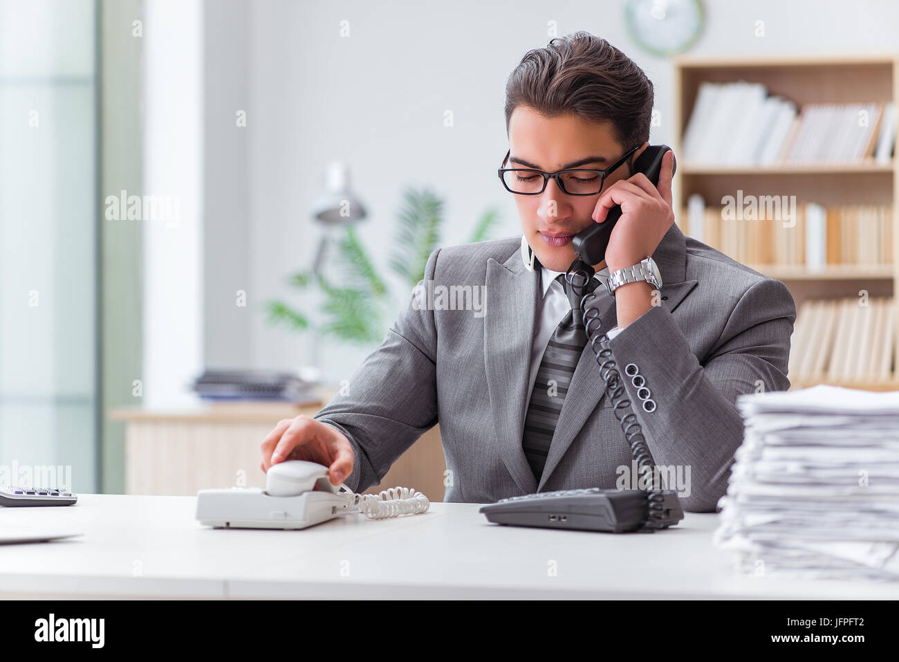 Call center operator talking on the phone Stock Photo - Alamy