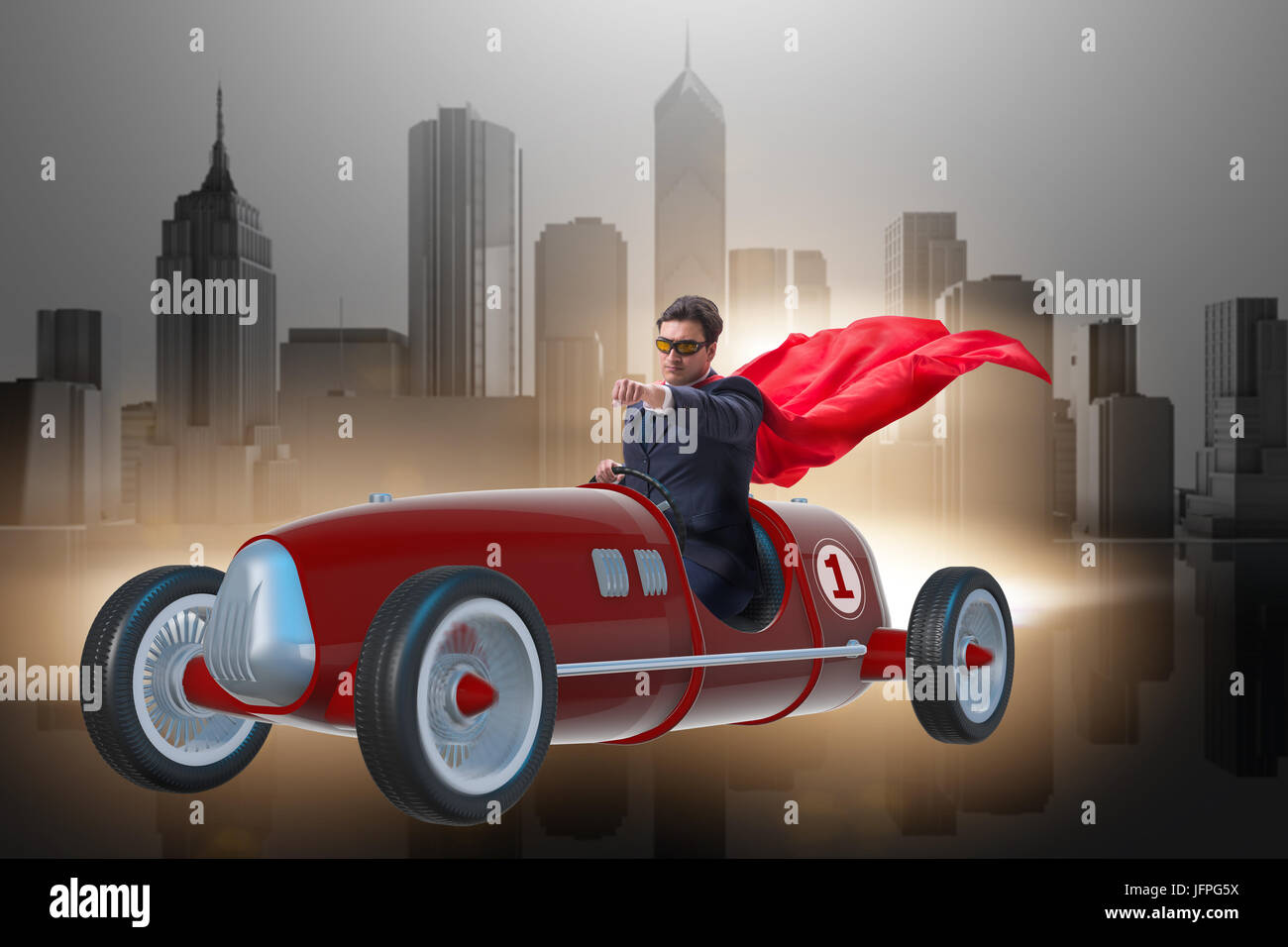 Superhero businessman driving vintage roadster Stock Photo - Alamy