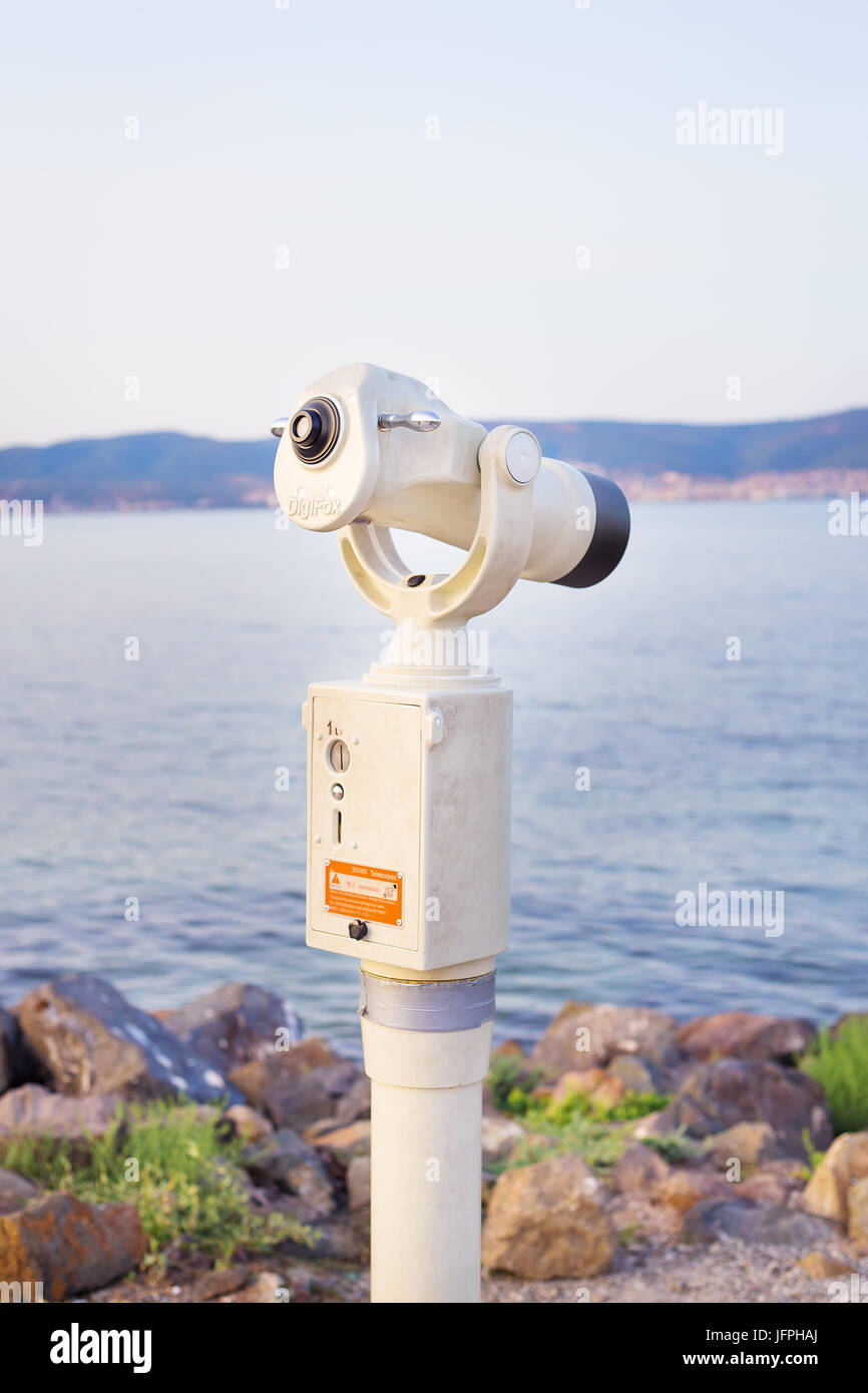Telescope on the sea-summer, sun, sea beach Stock Photo - Alamy