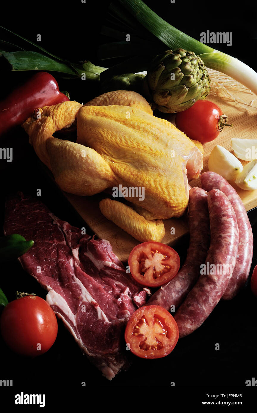 vegetables and meat with chicken and beef, with black background Stock ...