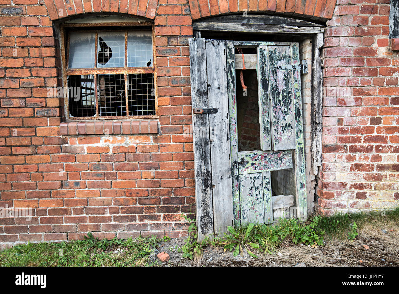 Broken door and window on farm building, Llangollen, Denbighshire ...