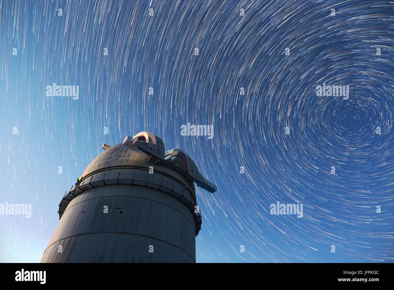 Astronomical observatory under the night sky stars. Blue sky with ...