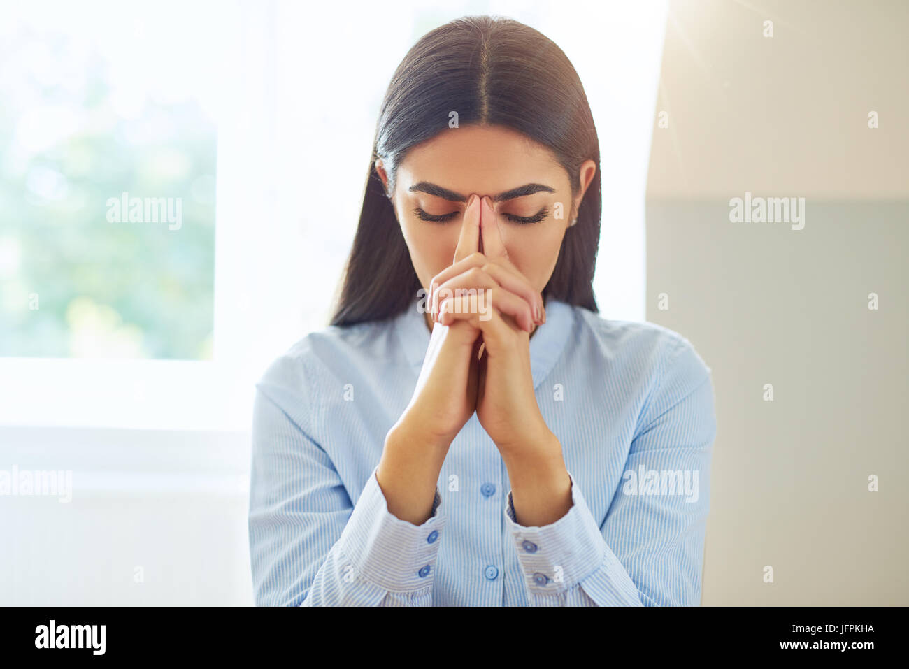 Office asian woman serious face hi-res stock photography and images - Alamy