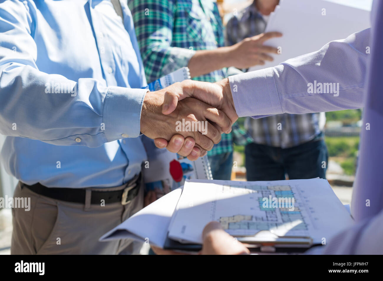 Builders Handshake Closeup, Two Building Business Men Making Deal After ...
