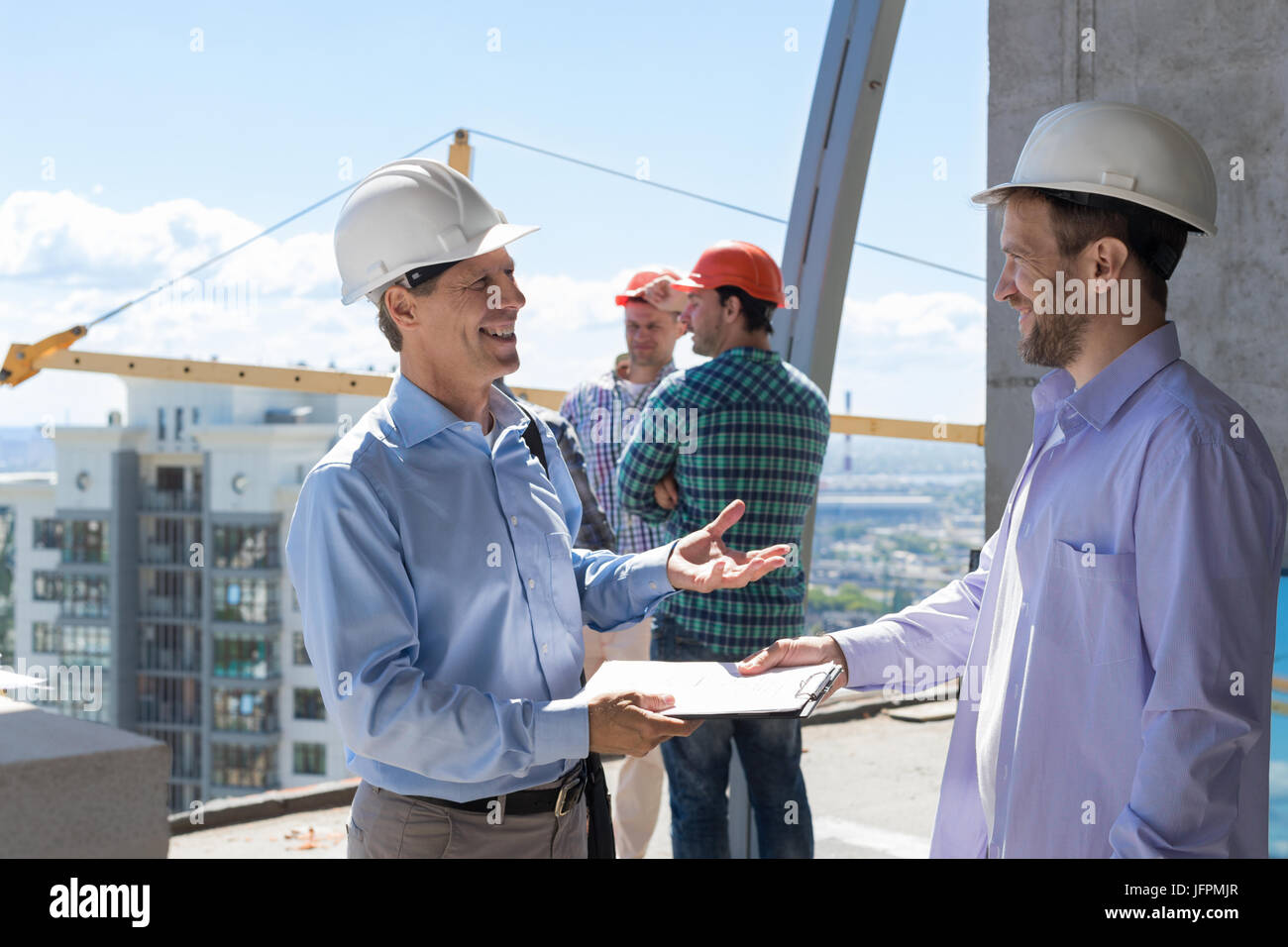 Two Building Business Men On Construction Site Meeting Signing Contract ...