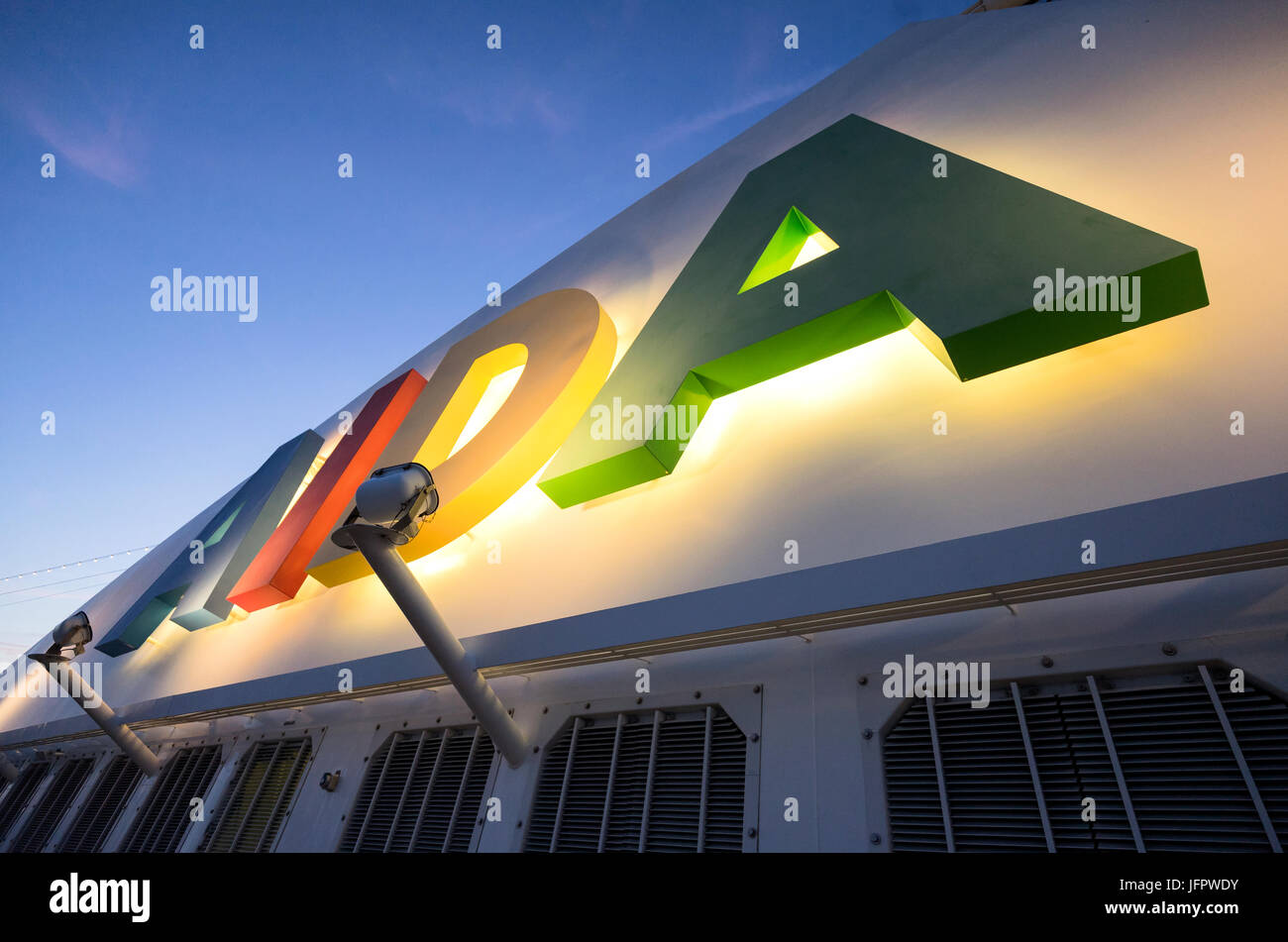 illuminated AIDA logo at the funnel of cruise ship AIDAsol. AIDA ...
