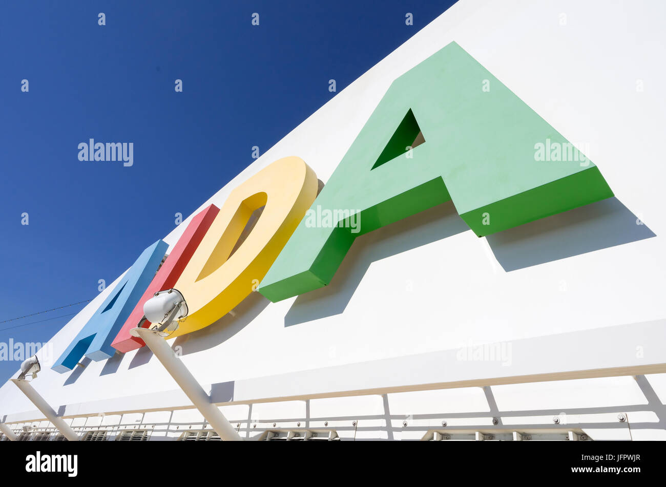 AIDA logo at the funnel of cruise ship AIDAsol. AIDA Cruises is one of ...