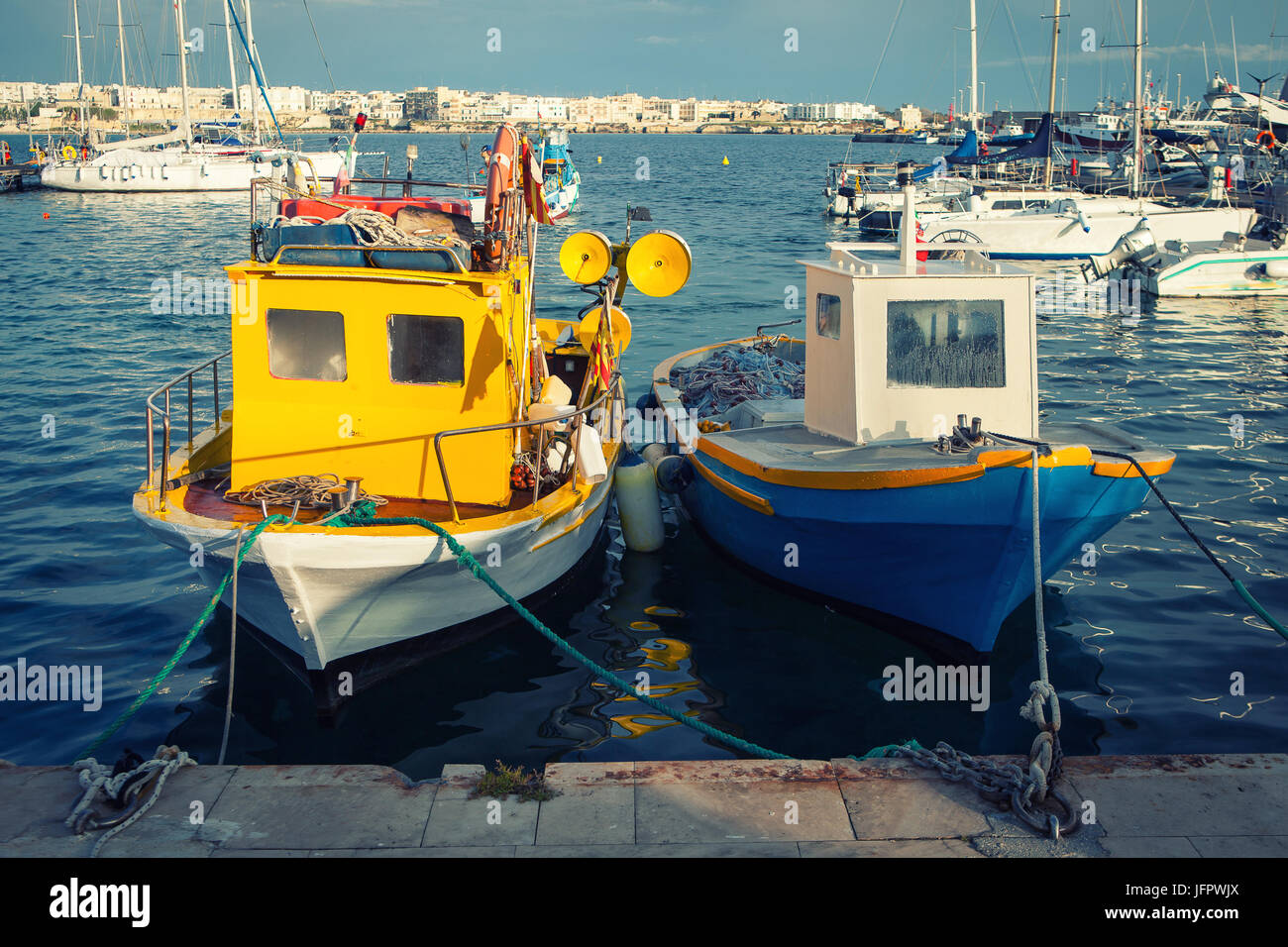 A typical old Italian fishing boats in the port Stock Photo - Alamy