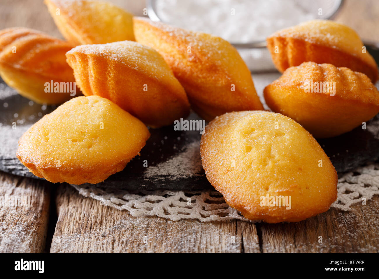 Beautiful cookies shell Madeleine close-up on the table. Horizontal ...