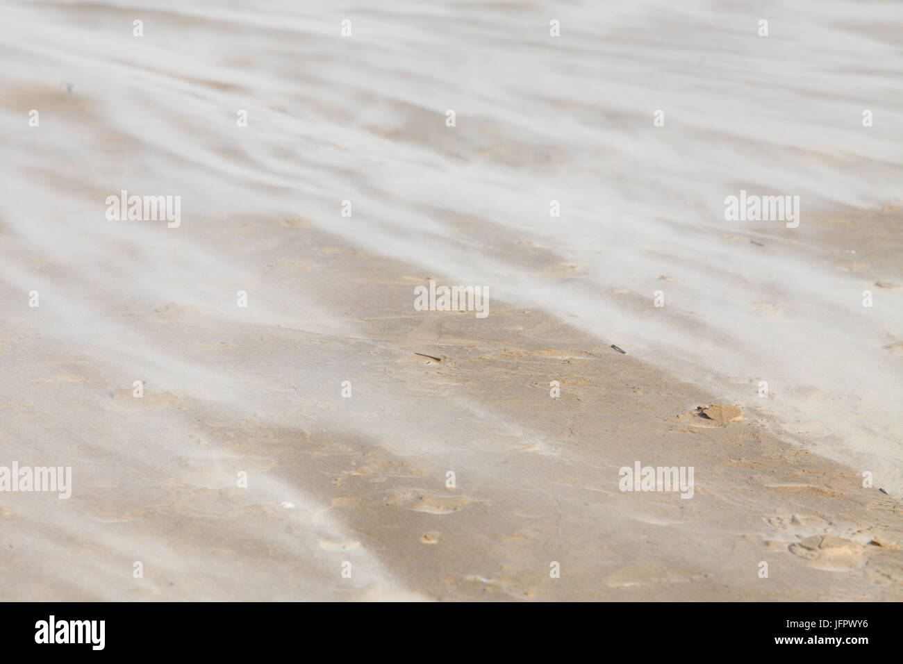 Wind blowing sand across beach hi-res stock photography and images - Alamy