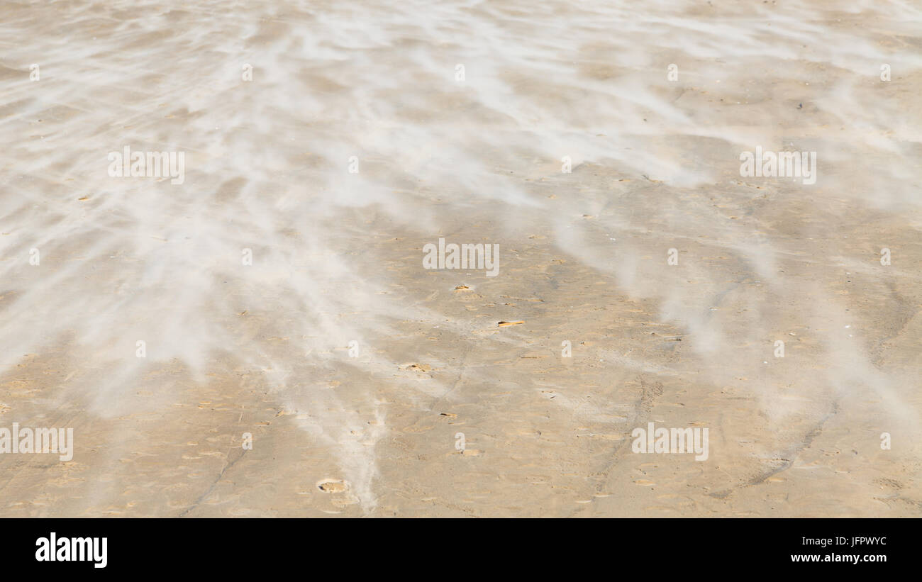 Wind blowing sand across beach hi-res stock photography and images - Alamy