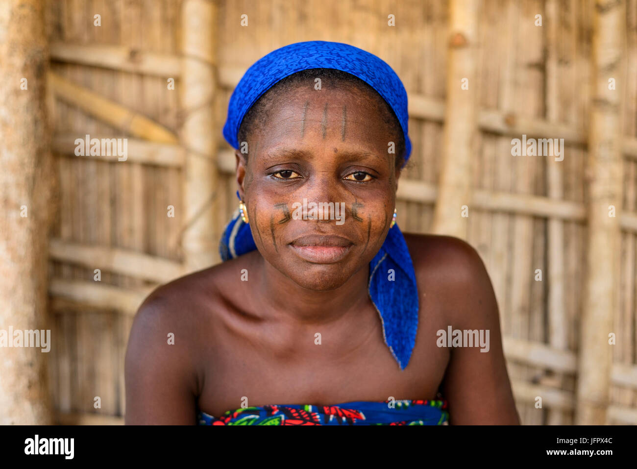 Holi woman in Benin Stock Photo - Alamy