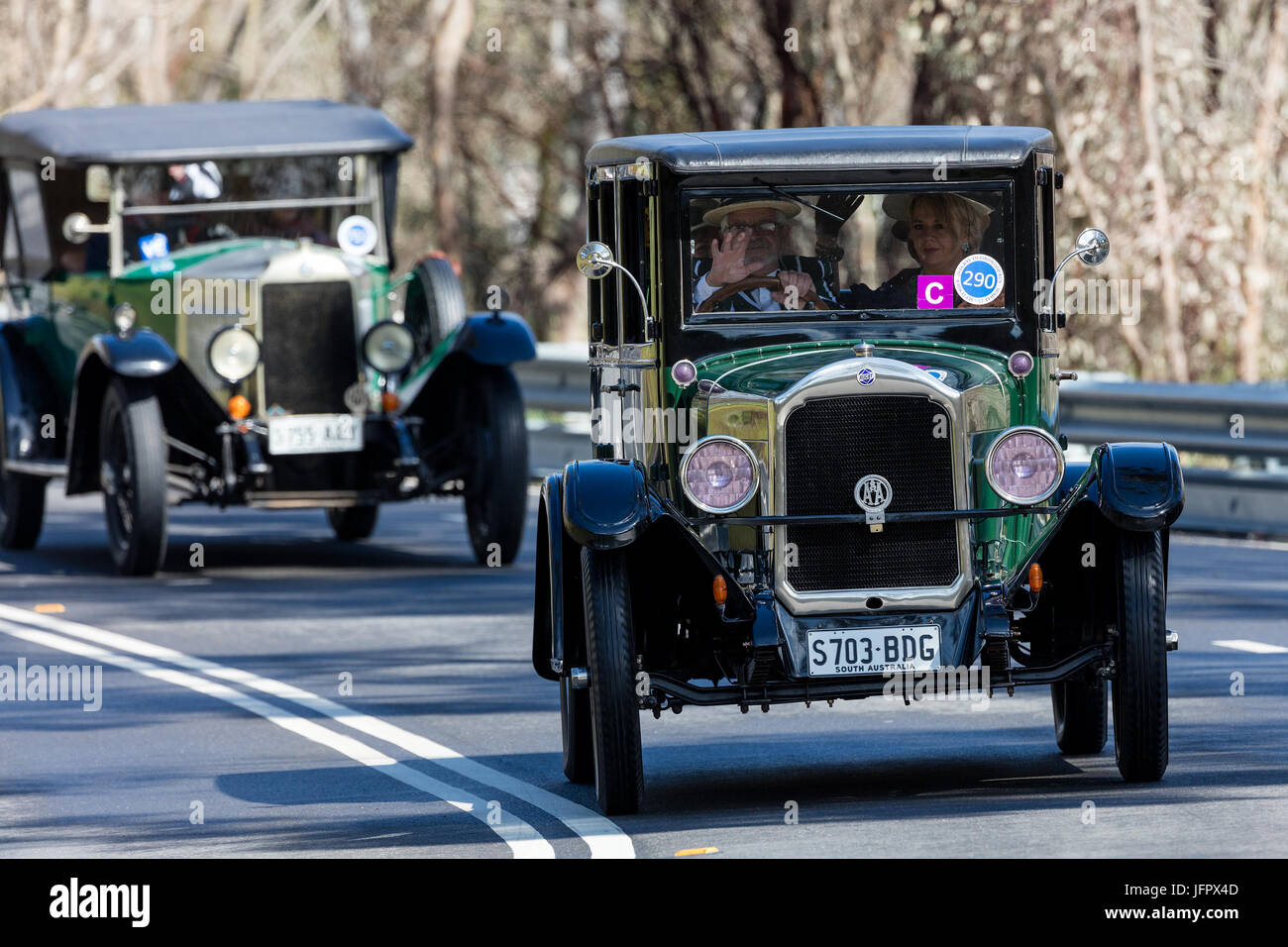 Vintage 1926 Rugby R Sedan driving on country roads near the town of ...