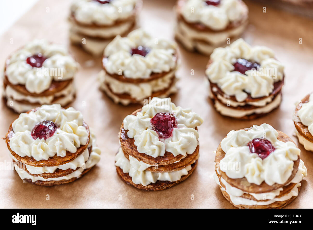 Millefeuille dessert with whipped cream and raspberry jam Stock Photo ...