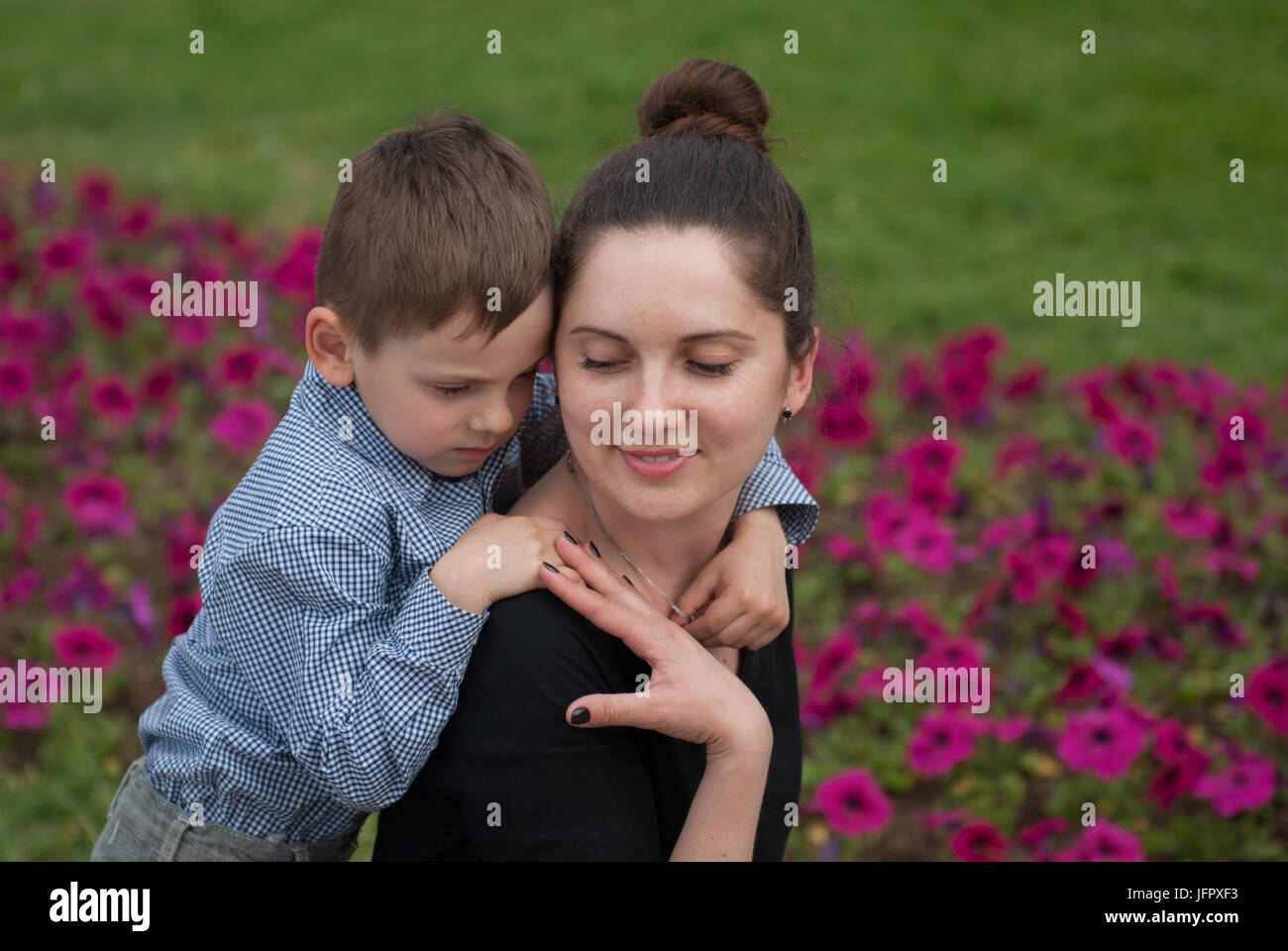 Gentle relations of mother and son Stock Photo - Alamy