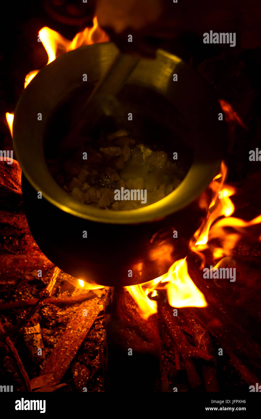 Old pot cooking over campfire hi-res stock photography and images - Alamy