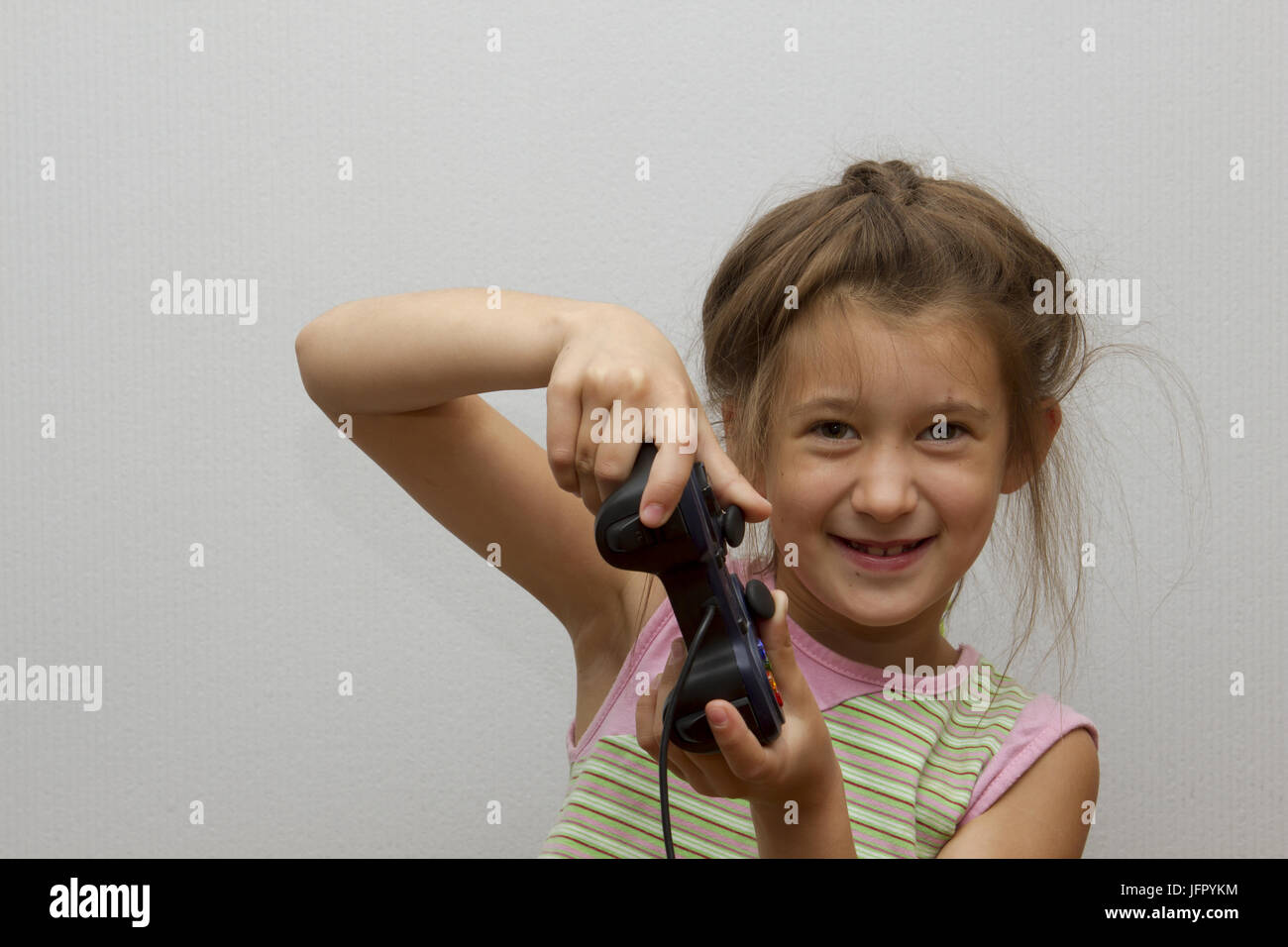 Girl using video game controller Stock Photo - Alamy Girl using video game controller Stock Photo - Alamy