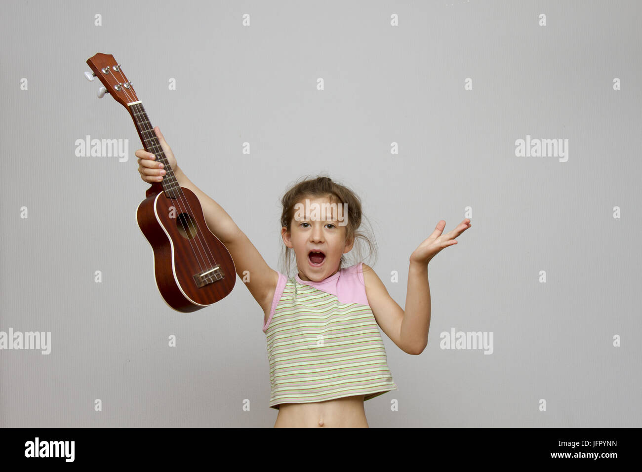 Ukulele lesson school hi-res stock photography and images - Alamy