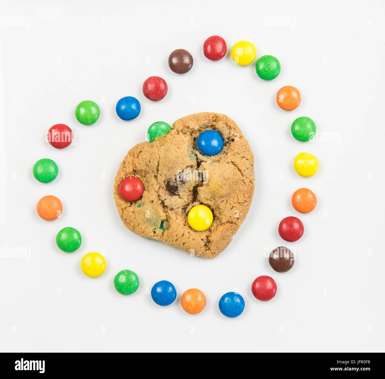 Delicious homemade sweet cookie inside a heart with colorful chocolate ...