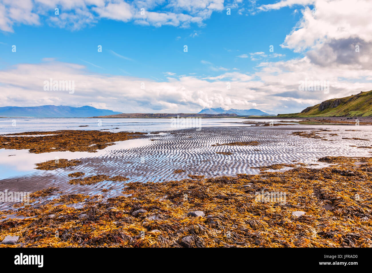 The bay of Hoonah during low tide at sunset Stock Photo - Alamy