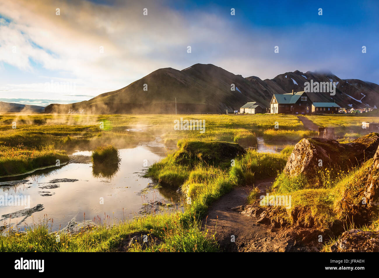 Above the source of thermal water steam rises Stock Photo - Alamy