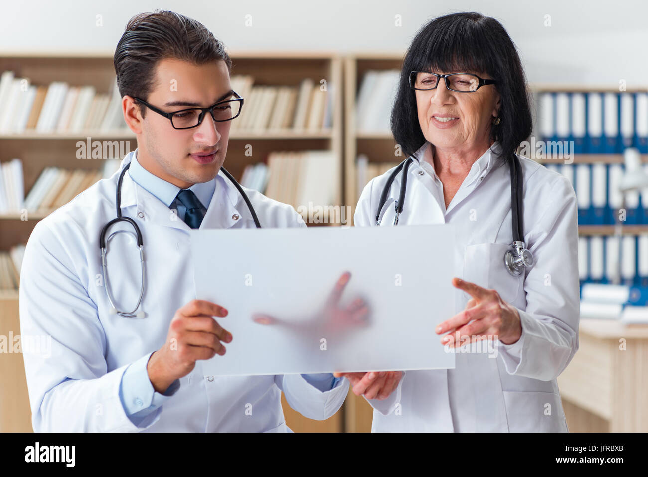 The two doctors working in the lab Stock Photo - Alamy