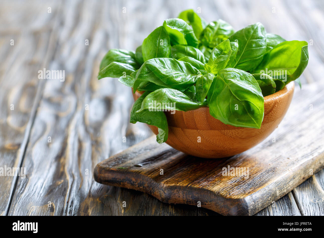 Green basil leaves in a drop of water Stock Photo - Alamy