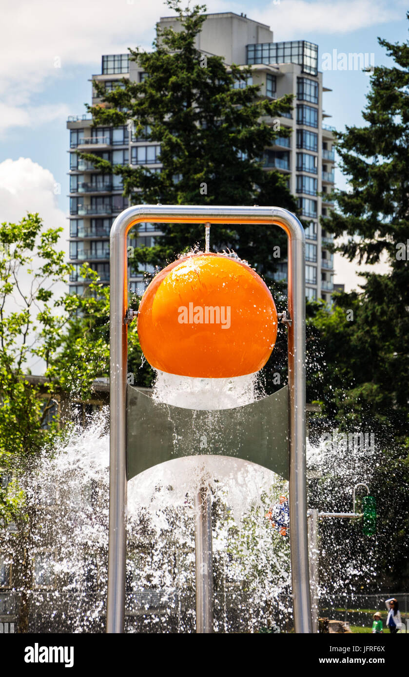 Giant water park splash bucket 1 Stock Photo - Alamy