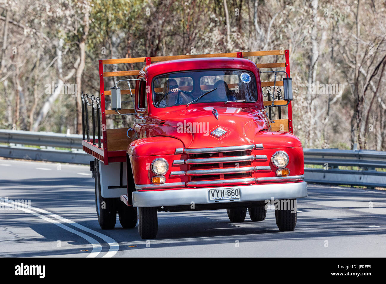 Vintage 1952 Diamond T 520 TrayTop Truck driving on country roads near ...