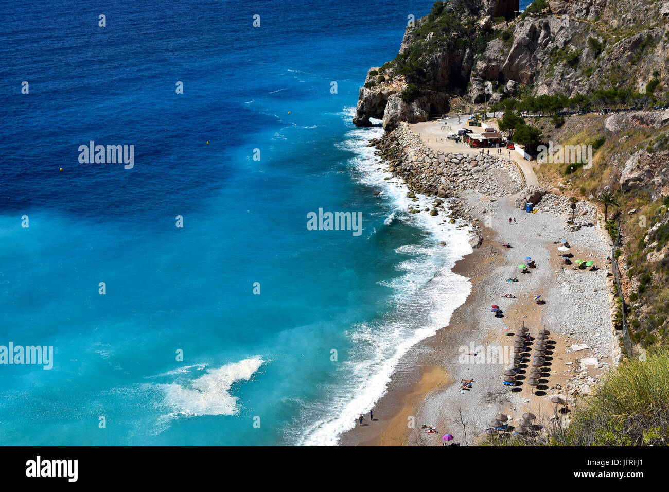 Cala Moraig Beach in Spain - beautiful blue water Stock Photo - Alamy