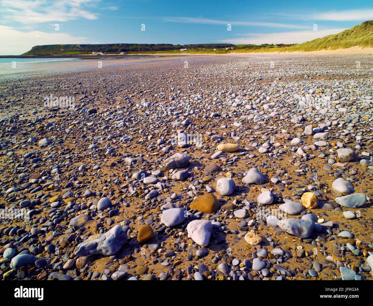 A view across the pebbled beach at Horton on the Gower Peninsula Stock ...