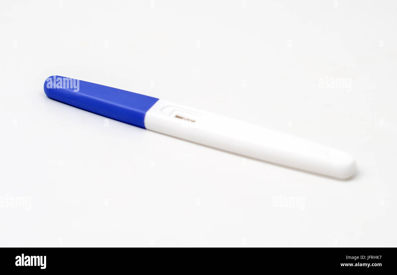 Plastic pregnancy test on the table Stock Photo - Alamy