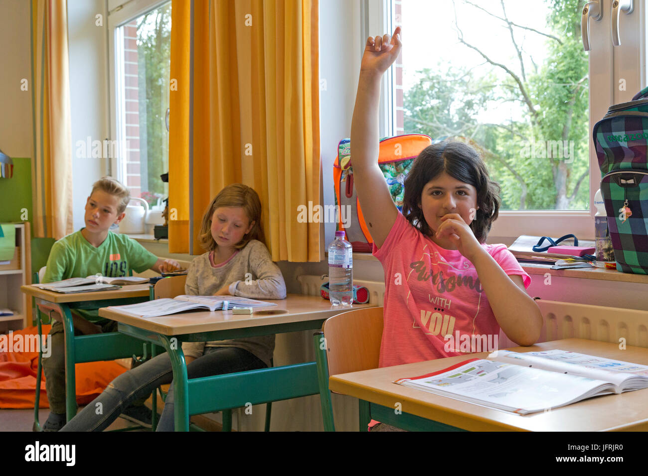 Pupils hand school hi-res stock photography and images - Alamy