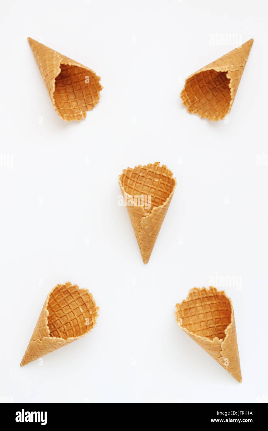 Several waffle cones lined in tower, smile, or even row, top view ...