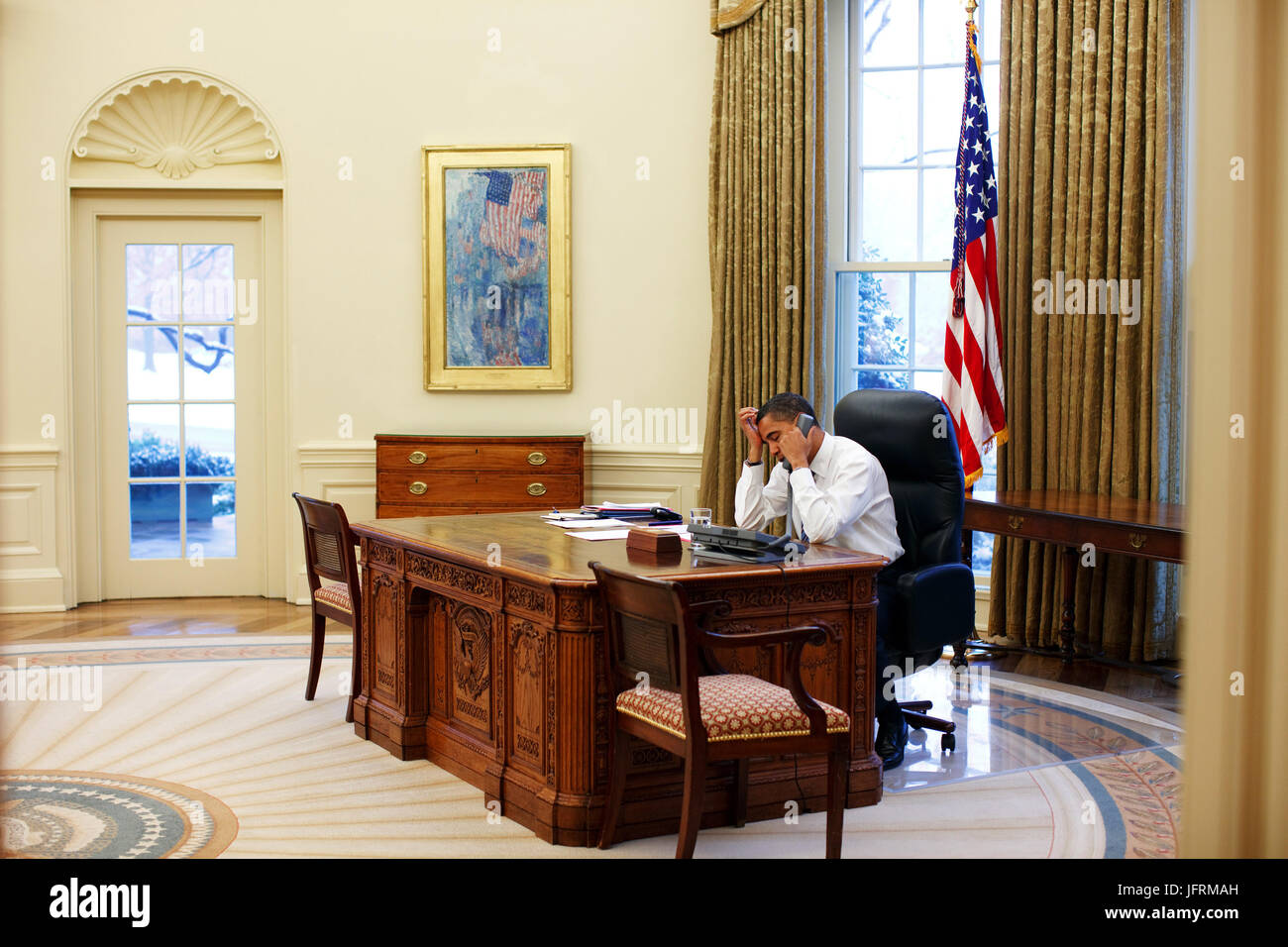 President Barack Obama in the Oval Office 1/28/09. Official White House ...