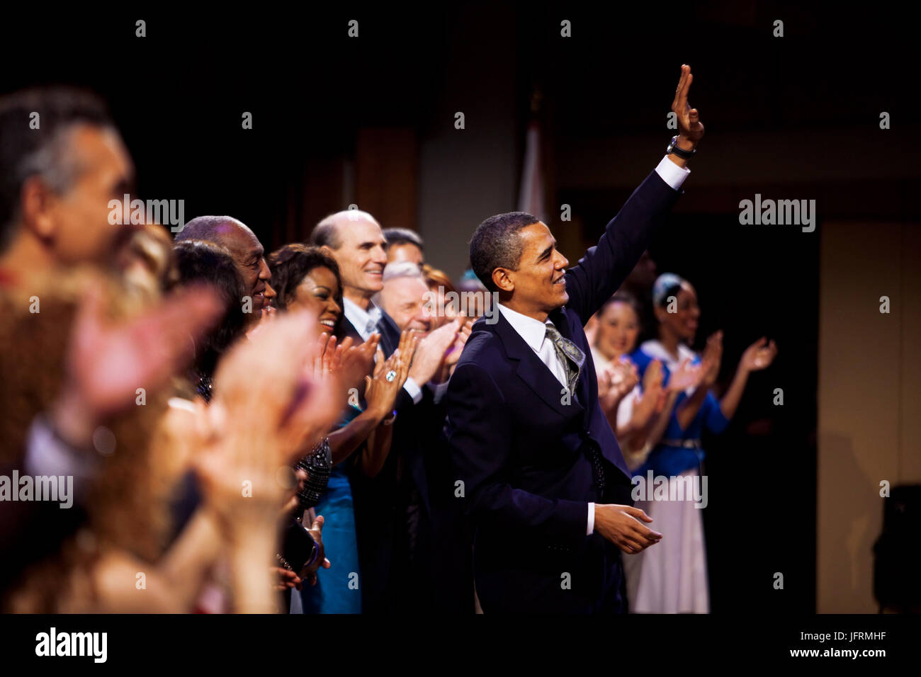 President Barack Obama waves at a musical birthday salute to Senator ...