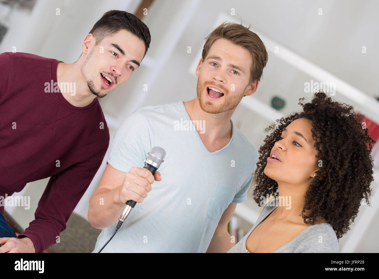 Three male singers hi-res stock photography and images - Alamy