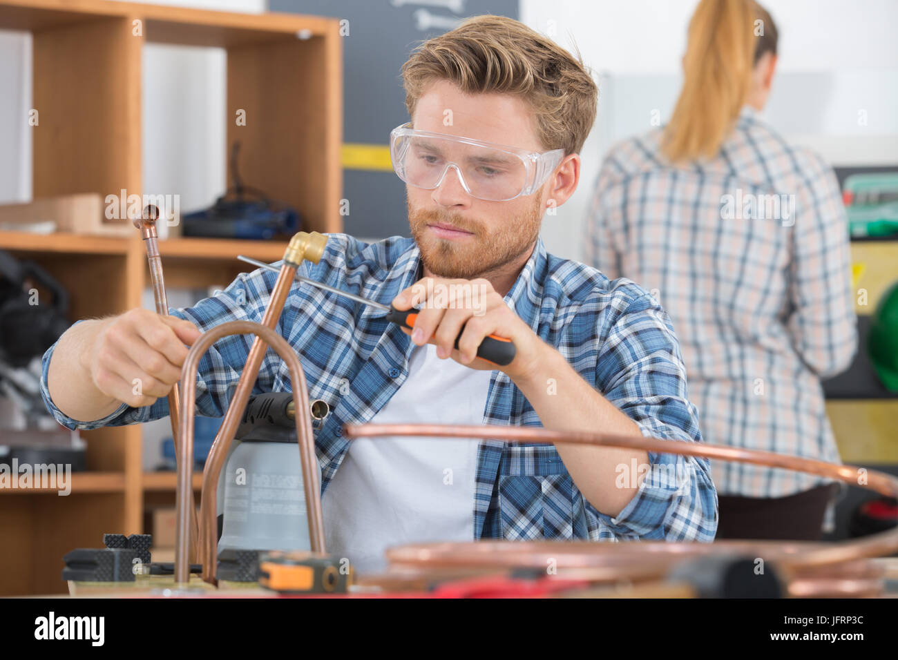 working with tubes Stock Photo - Alamy