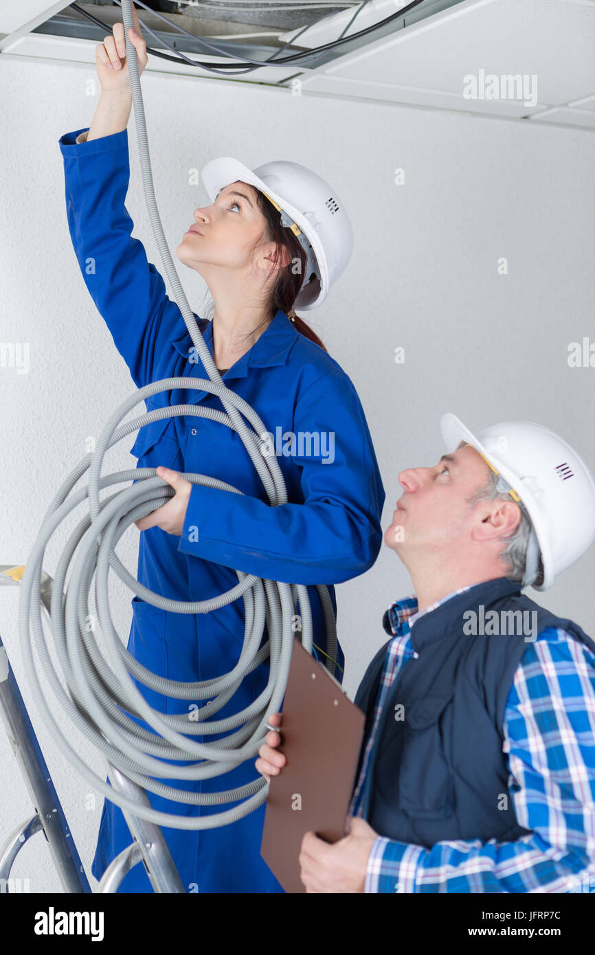 Installing wires hi-res stock photography and images - Alamy