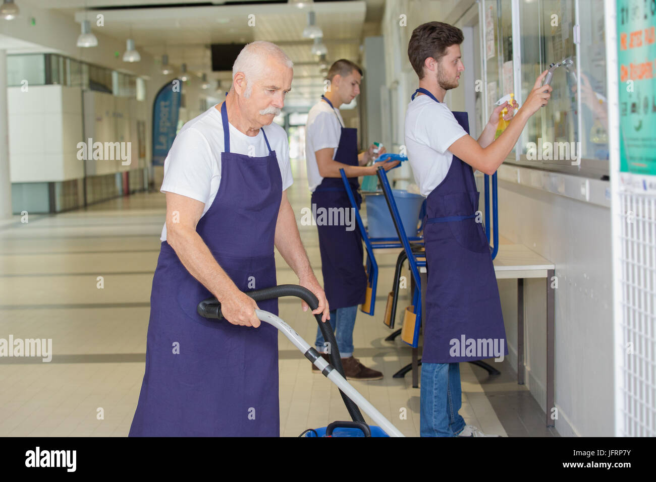 cleaners team working Stock Photo - Alamy