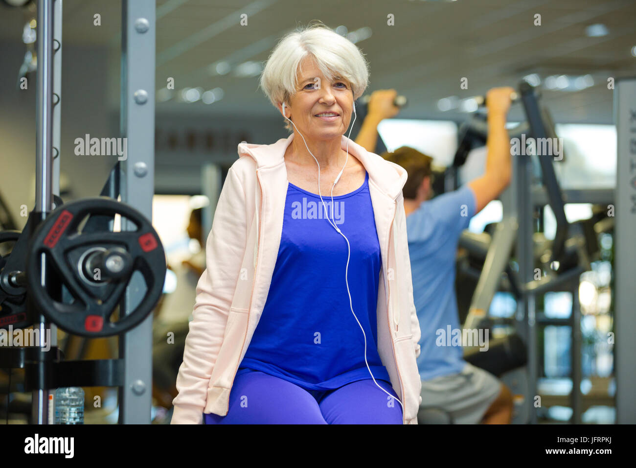 Old lady lifting weights hi-res stock photography and images - Alamy