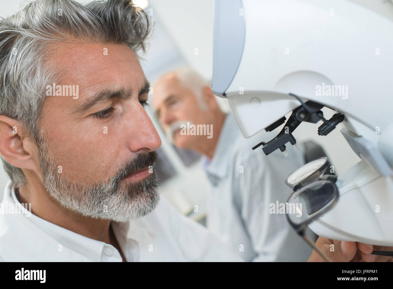 Male scientist using microscope hi-res stock photography and images - Alamy
